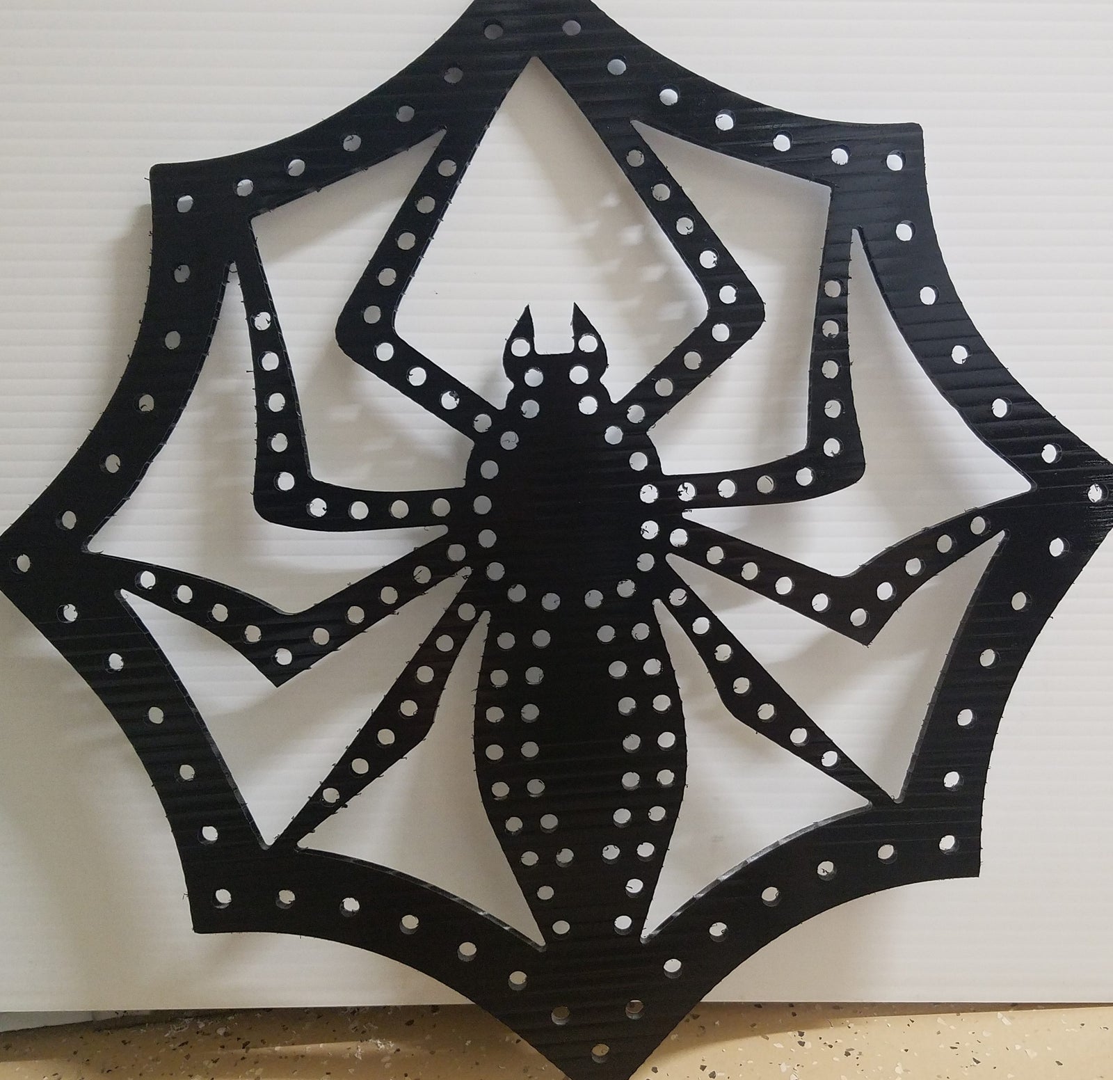 Laser Cut Spider in Web for RGB Pixels by Gilbert Engineering